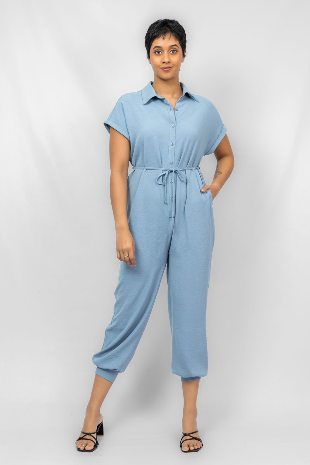 Odel Light Blue Cap Sleeve Buttoned Waist Tie Up Jumpsuit | Odel.lk